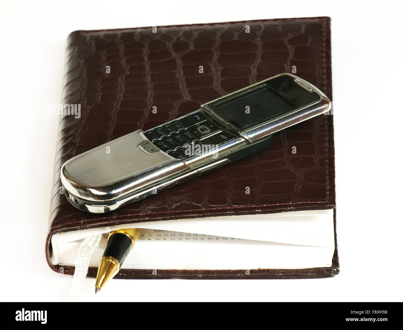 Notebook and pen Stock Photo - Alamy