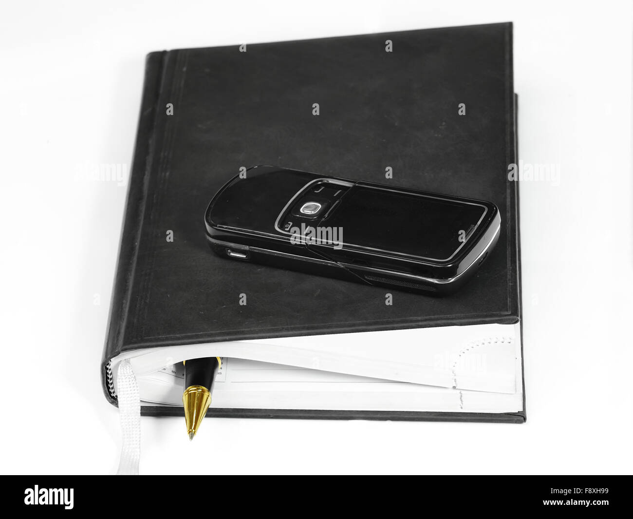 Notebook and pen Stock Photo - Alamy