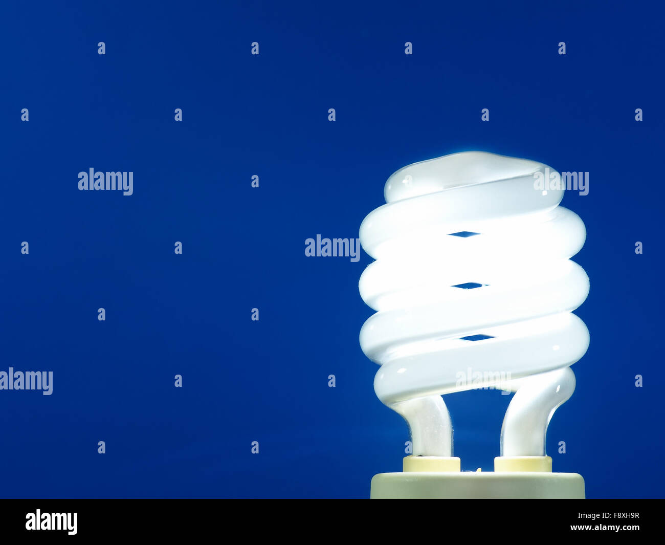 a blue energy efficient light bulb Stock Photo - Alamy