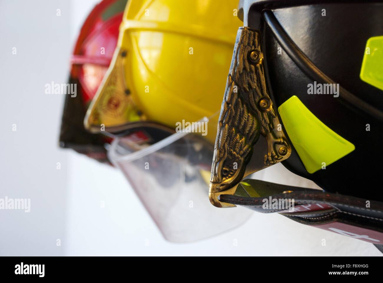 Three Fireman Hats on White Wall Stock Photo - Alamy