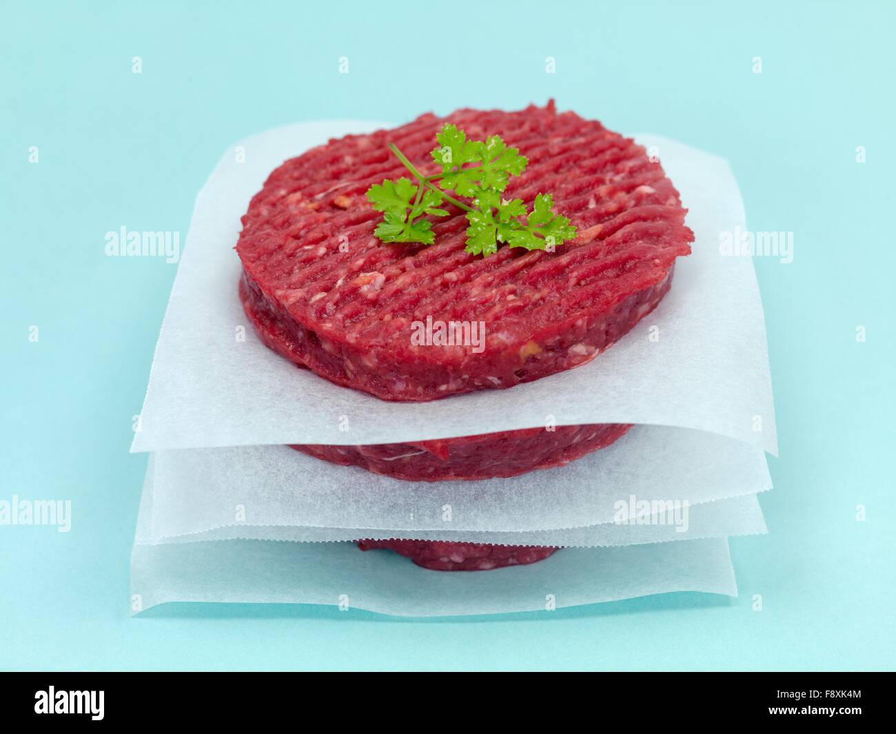 Raw Beef Patties Stock Photo - Alamy