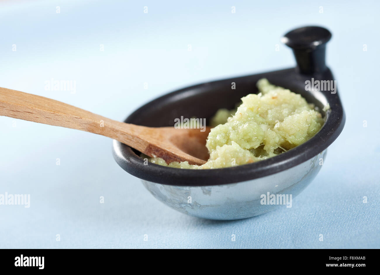 Ginger garlic paste in small bowl Stock Photo - Alamy
