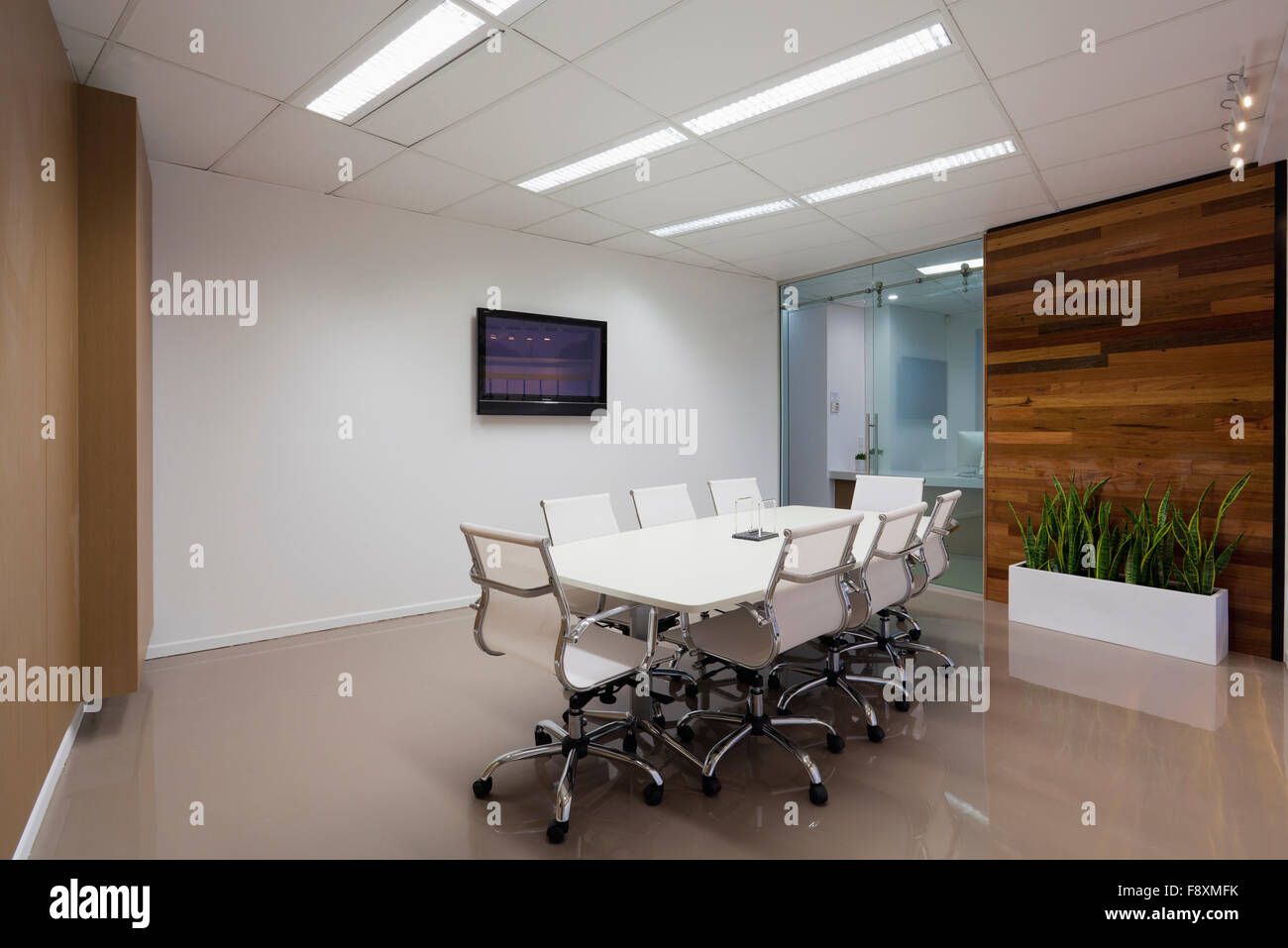 New board room with table chairs and plasma display Stock Photo - Alamy