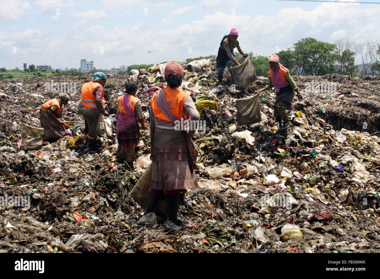 Male female waste pickers pick hi-res stock photography and images - Alamy