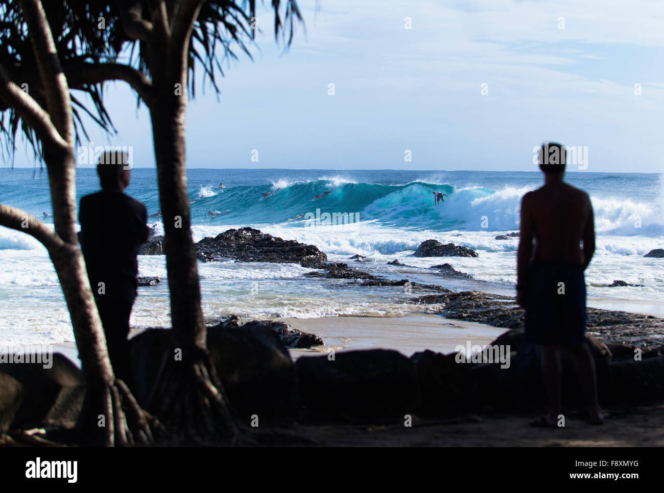 Surfers catching big waves at Snapper Rocks on the Gold Coast ...