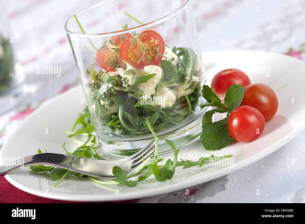Small salad served in a glass Stock Photo - Alamy