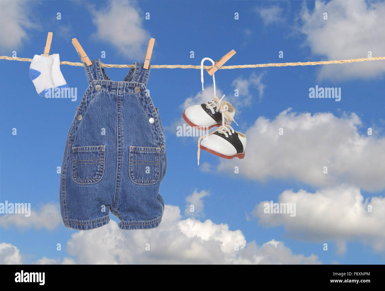 Baby Boy Clothes Hanging Outdoors Stock Photo - Alamy