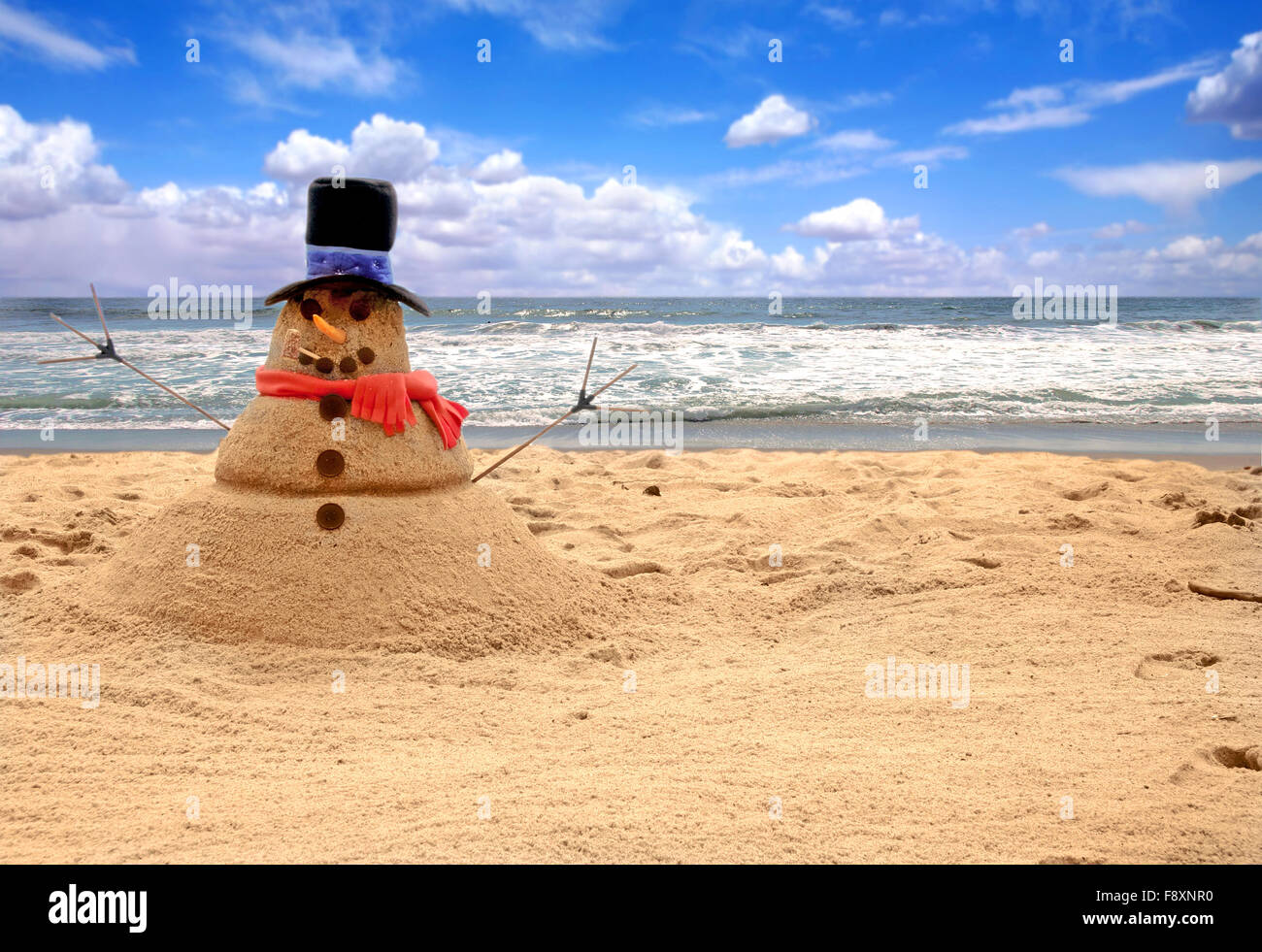 Snowman Made of Sand on the Beach Stock Photo - Alamy