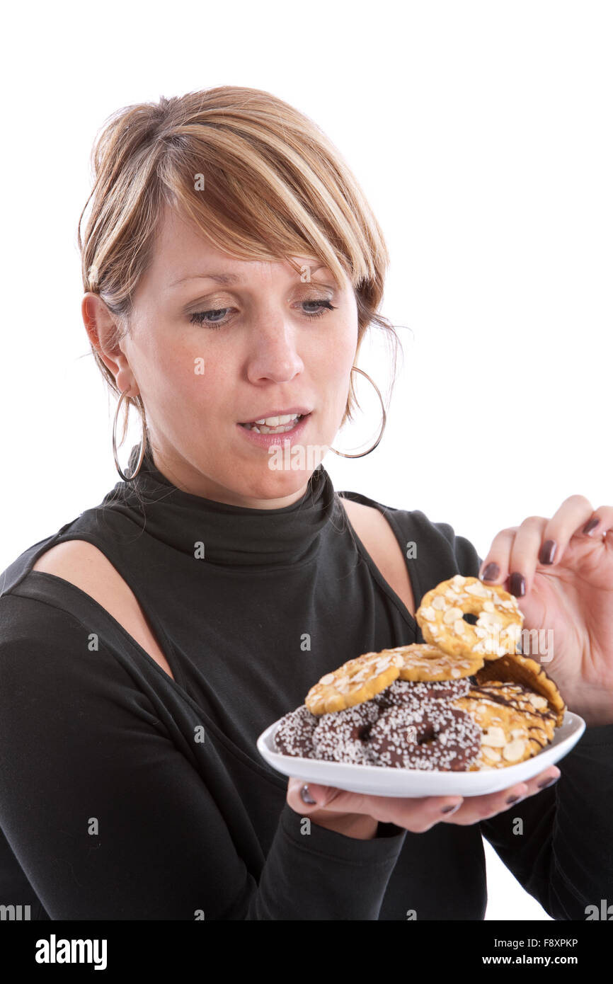 Taking a cookie Stock Photo - Alamy