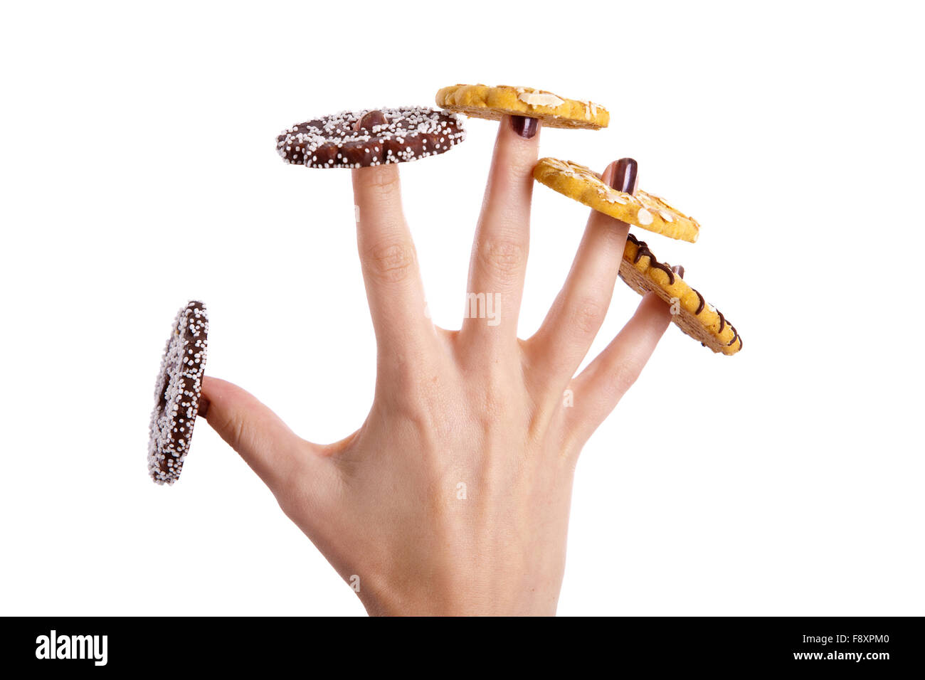 Handfull of cookies Stock Photo - Alamy
