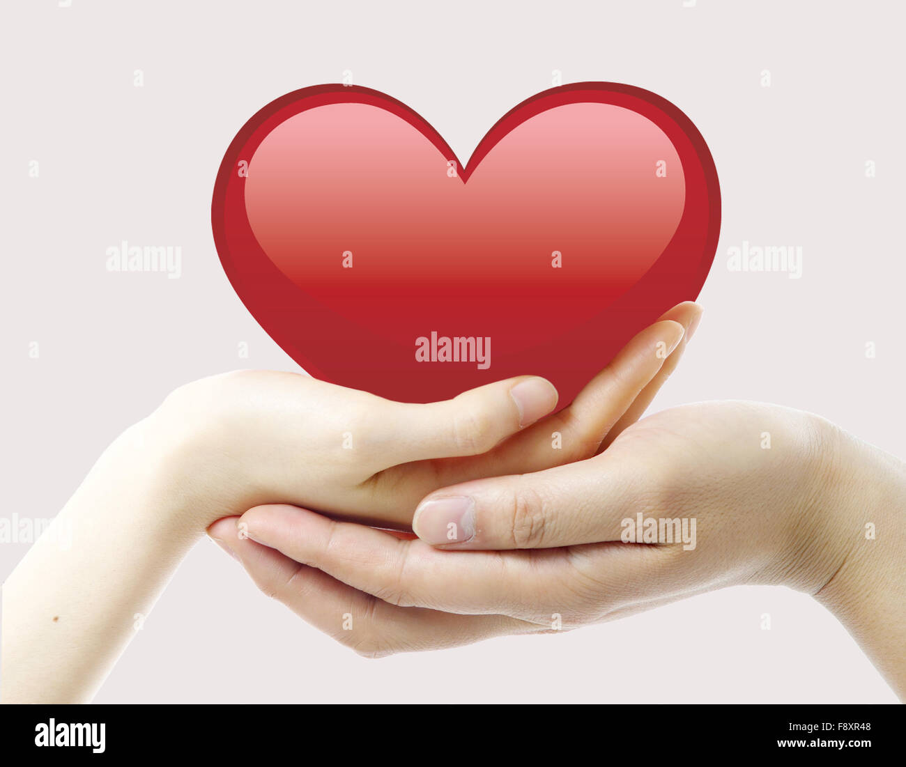 Couple hand heart hi-res stock photography and images - Alamy