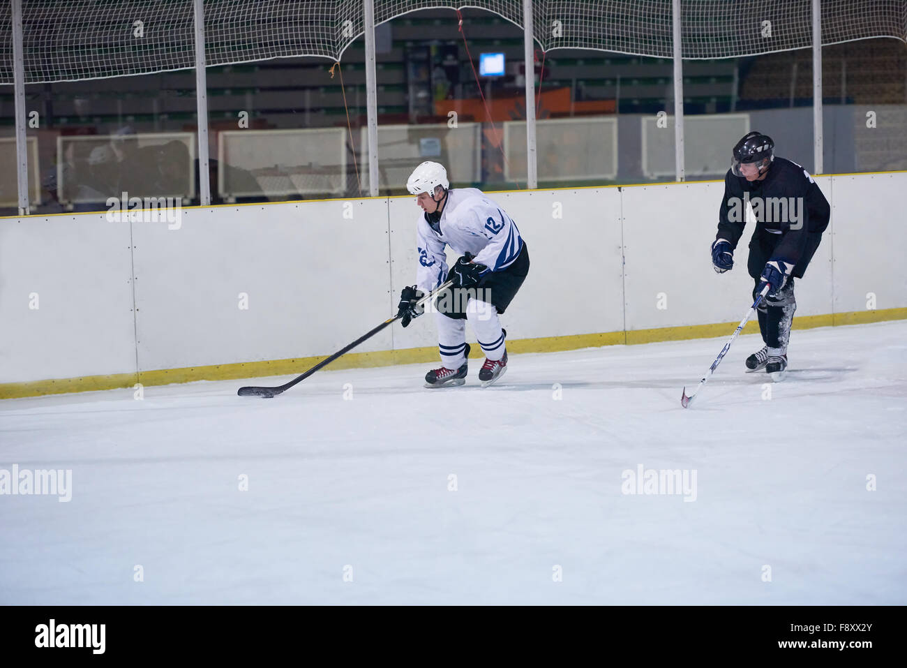 ice hockey sport players in action, business comptetition concpet Stock ...