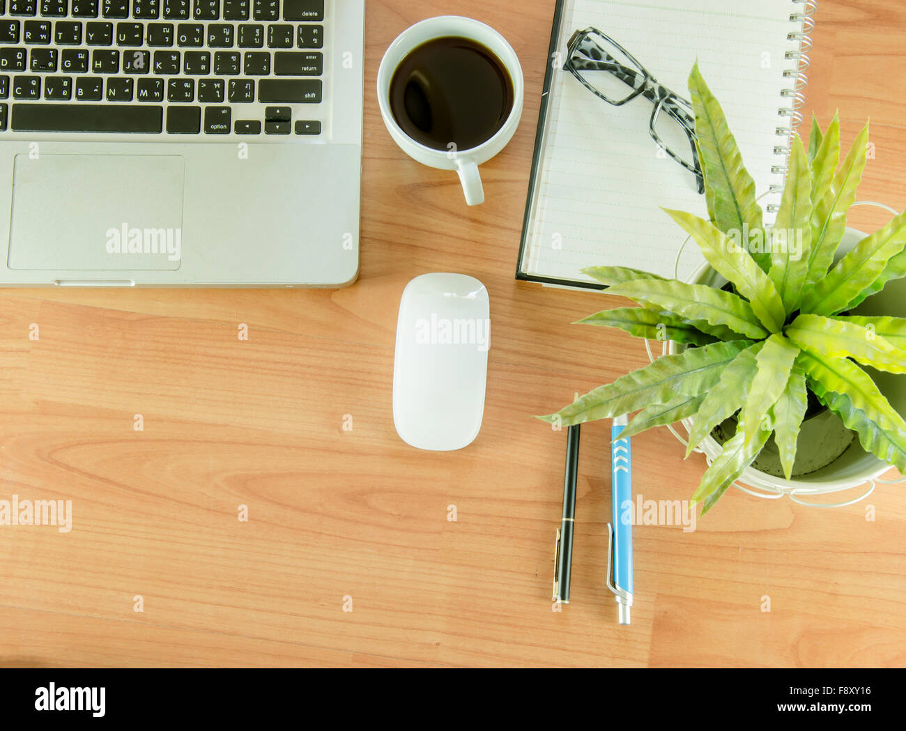 Top view of office desk with computer Stock Photo - Alamy