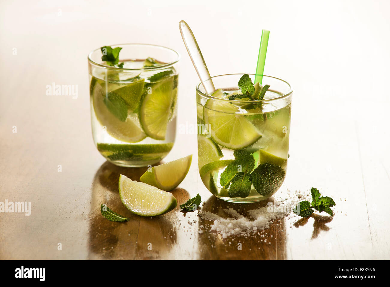 Cold Mojito cocktail on a rustic table close up Stock Photo - Alamy