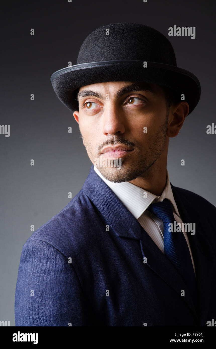 Man with hat in vintage concept Stock Photo - Alamy