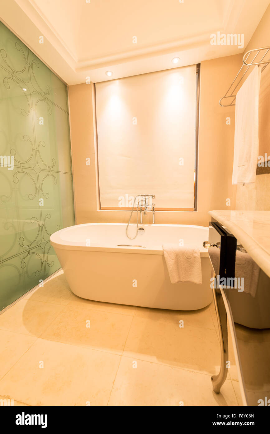 Modern bathroom interior with bathtub Stock Photo - Alamy