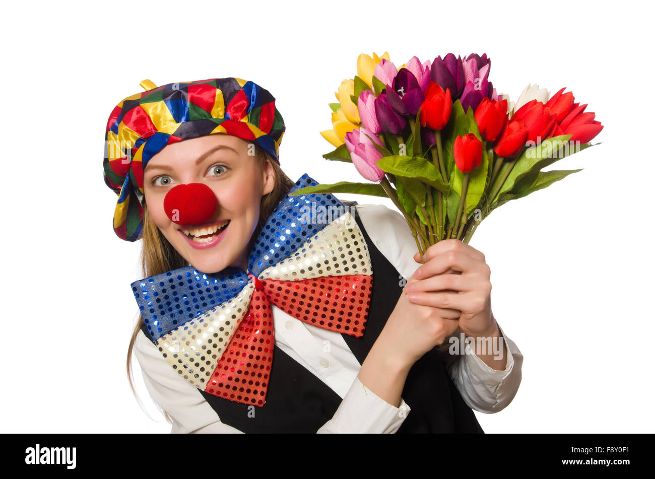 Pretty female clown with flowers isolated on white Stock Photo - Alamy