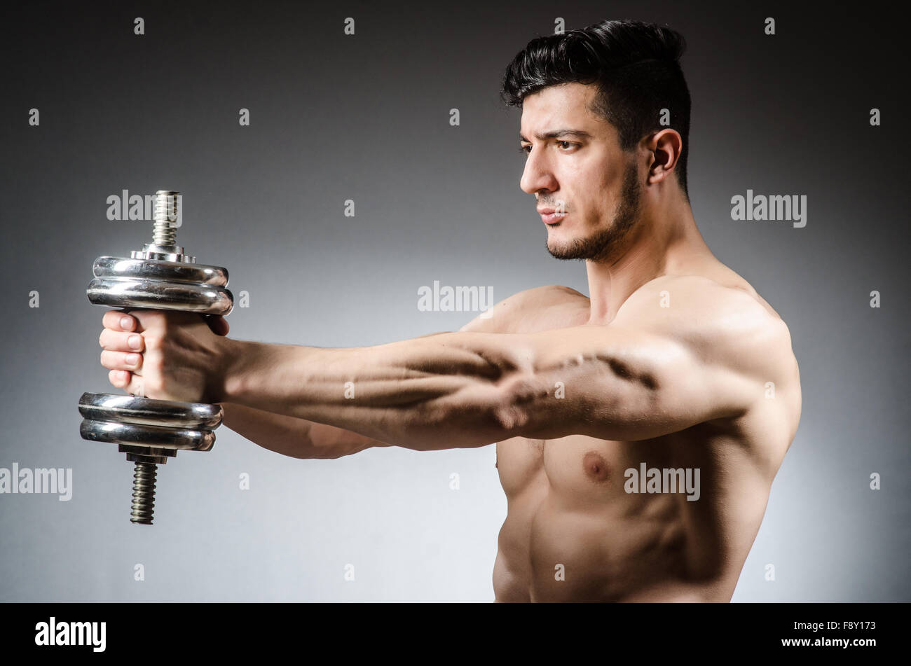 Muscular ripped bodybuilder dumbbells hi-res stock photography and ...