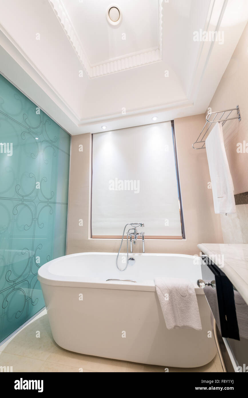 Modern bathroom interior with bathtub Stock Photo - Alamy