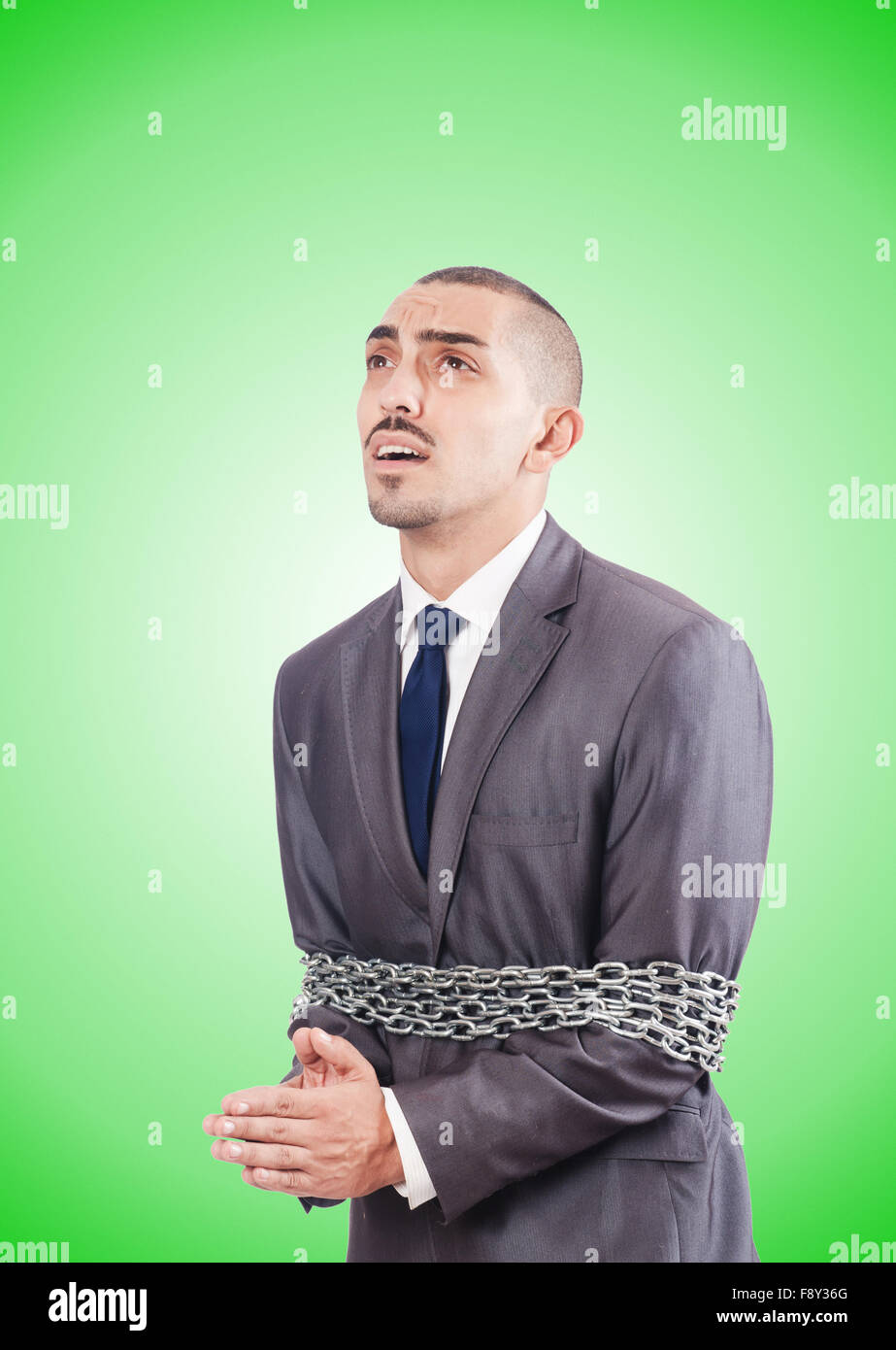 Arrested businessman in studio shooting Stock Photo - Alamy