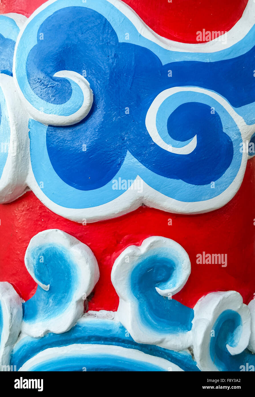 Cloud sculpture in the Chinese style on red temple Stock Photo - Alamy