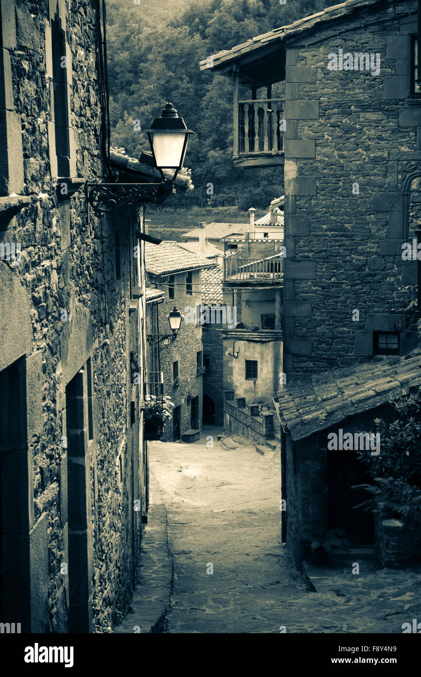 Retro photo of Narrow street in medieval Catalan village in Pyrenees ...