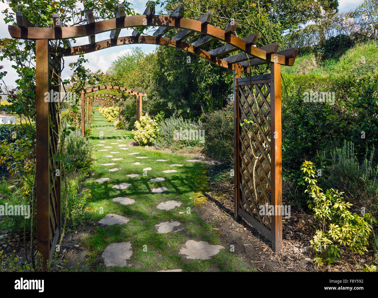 Wooden arches over pathway in spring park on Saumur town (France Stock ...