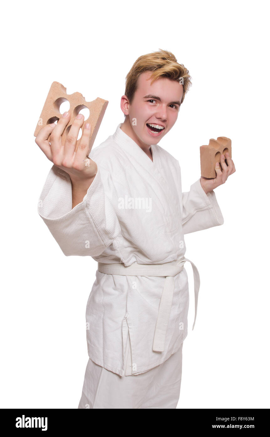 Funny karate man breaking bricks isolated on white Stock Photo - Alamy