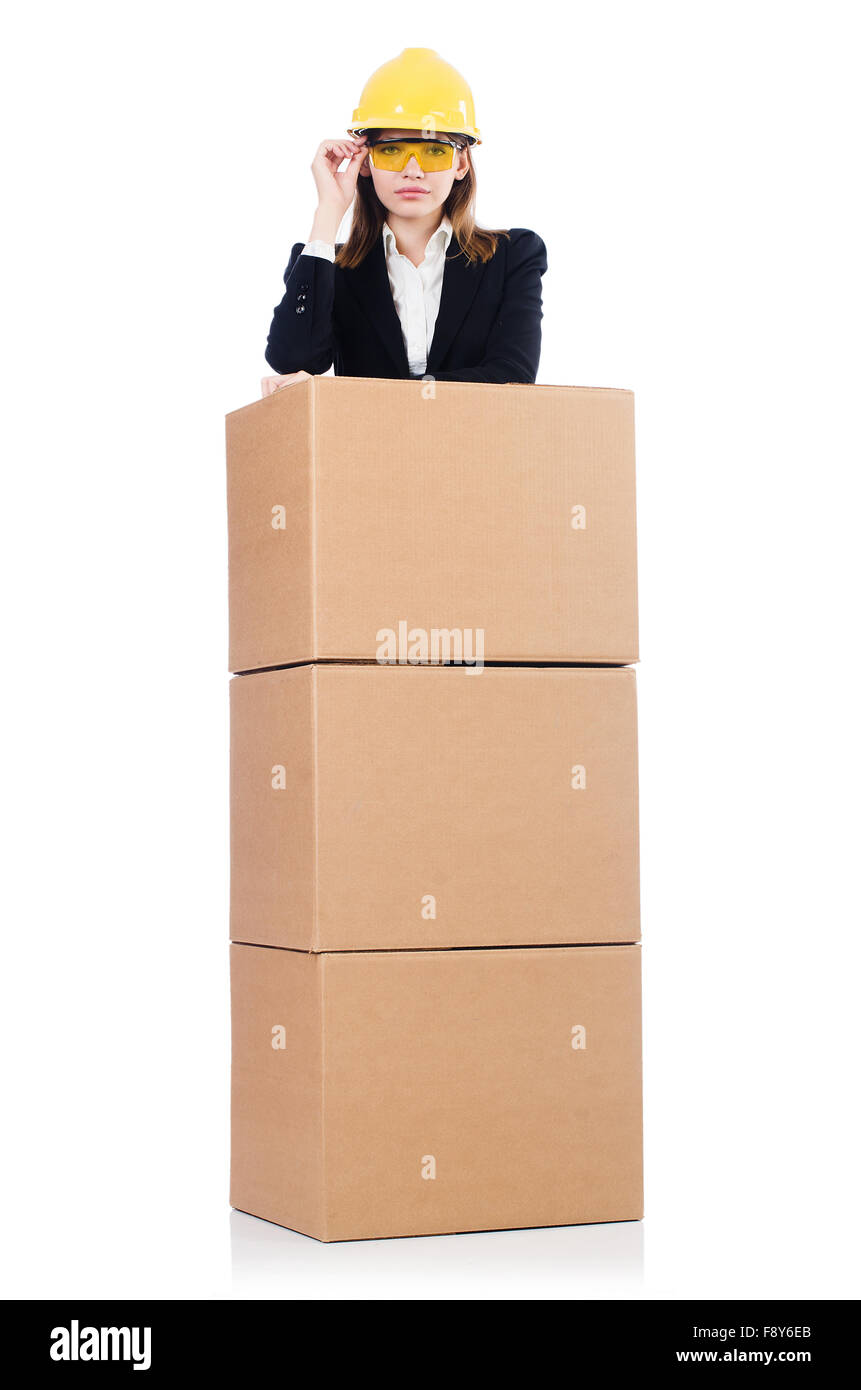 Young builder woman with boxes isolated on white Stock Photo - Alamy