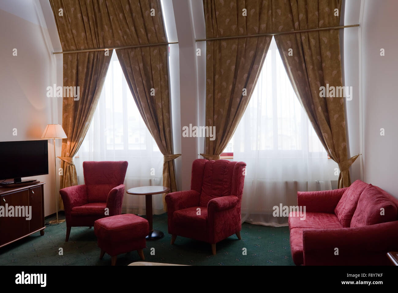 interior of luxury living room with two window Stock Photo - Alamy