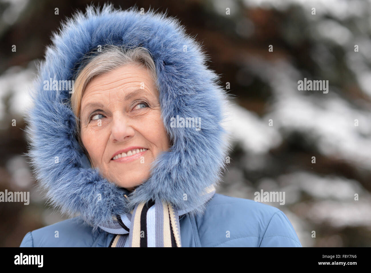 Old woman in the winter Stock Photo - Alamy