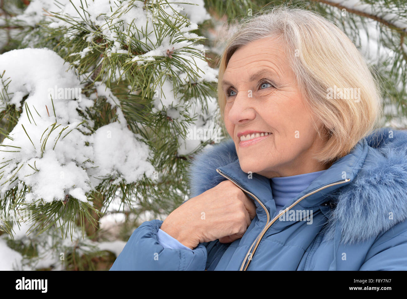 Old woman in the winter Stock Photo - Alamy