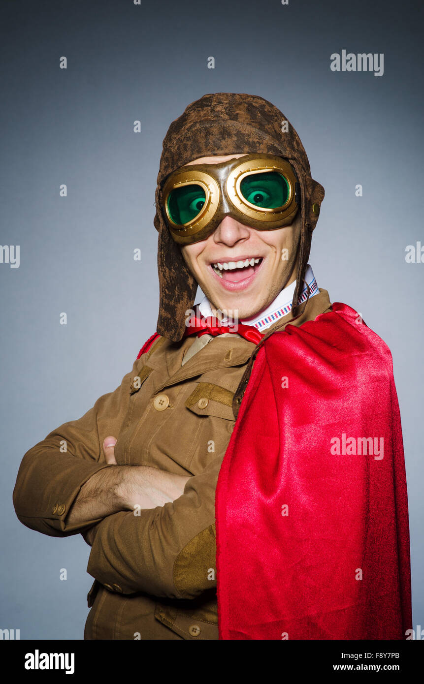 Funny pilot with goggles and helmet Stock Photo - Alamy