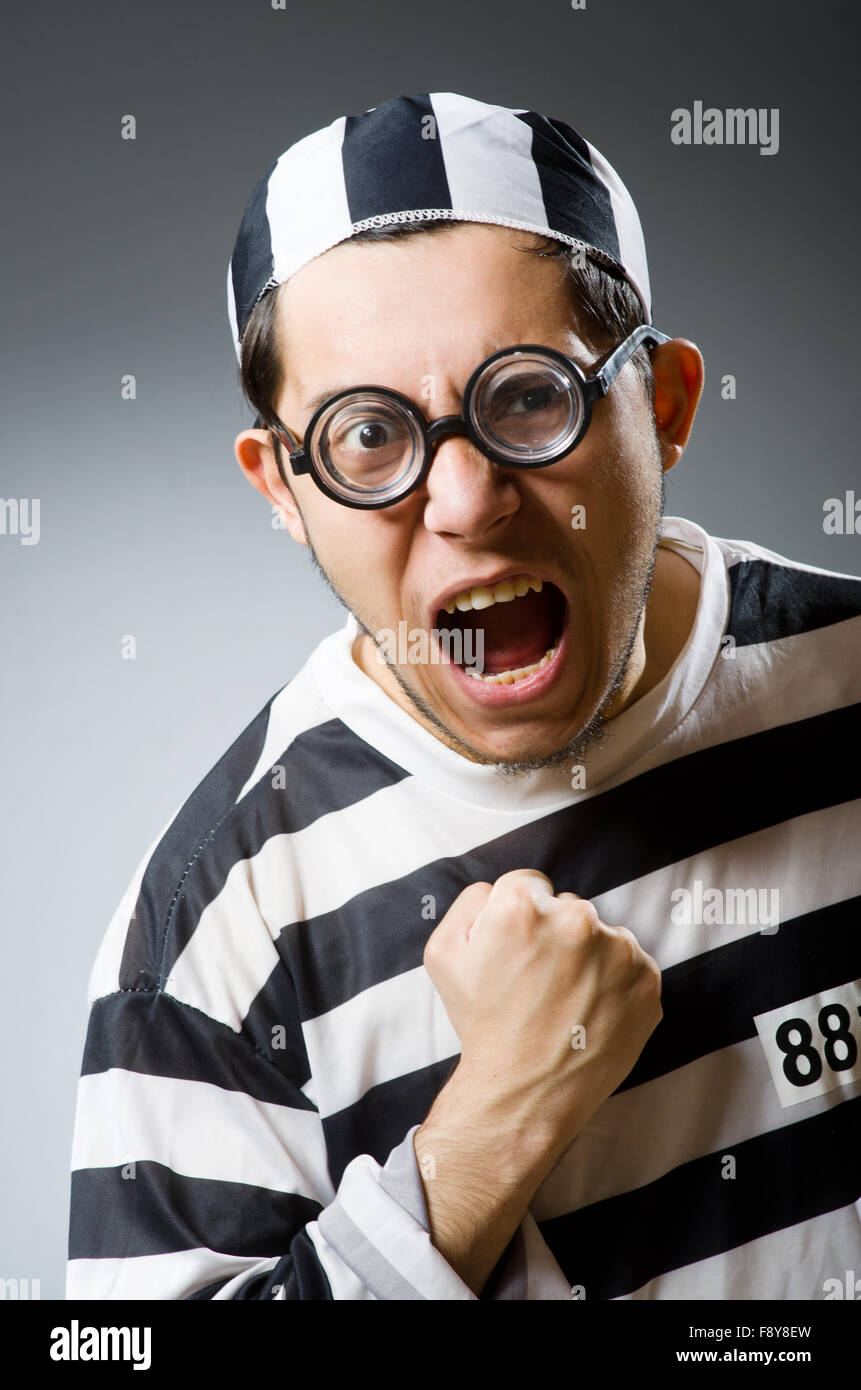 Funny prison inmate in concept Stock Photo - Alamy