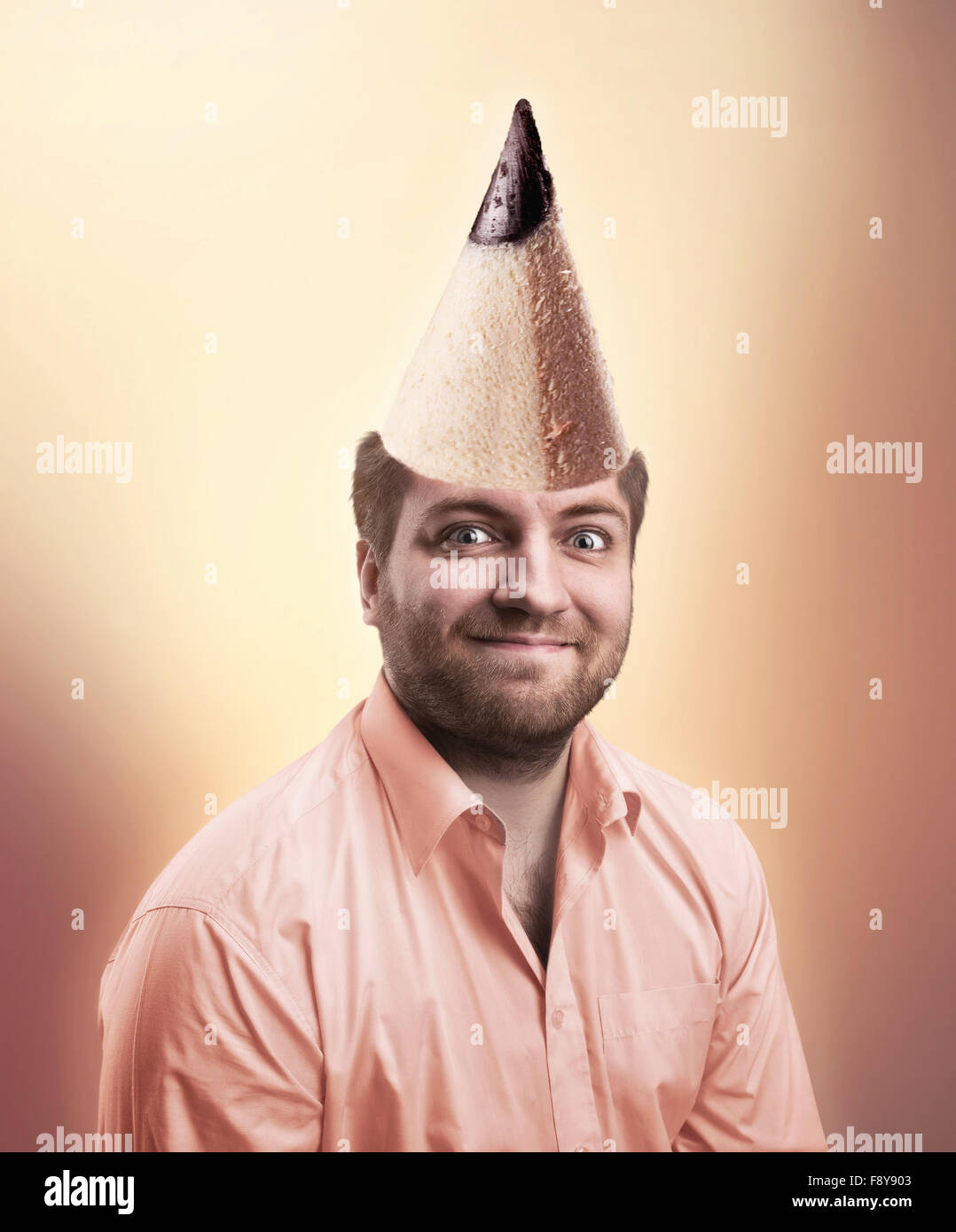 Man with pencil cone on the head Stock Photo - Alamy