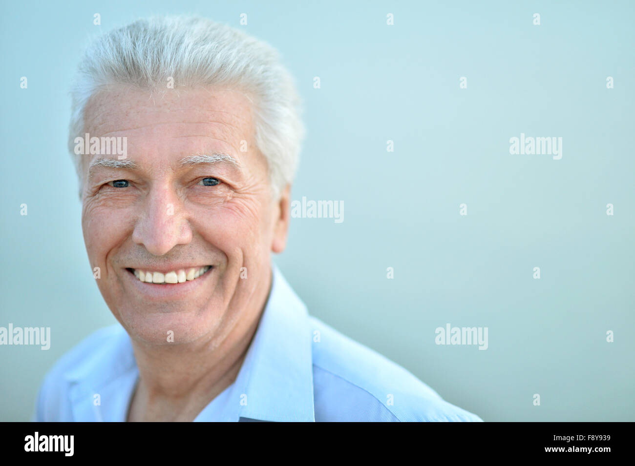 smiling elderly man Stock Photo - Alamy
