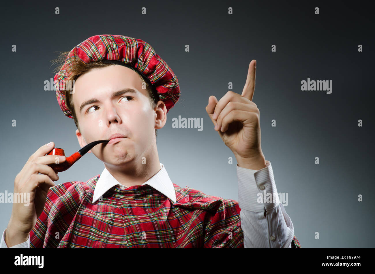 Funny scotsman smoking pipe tobacco Stock Photo - Alamy