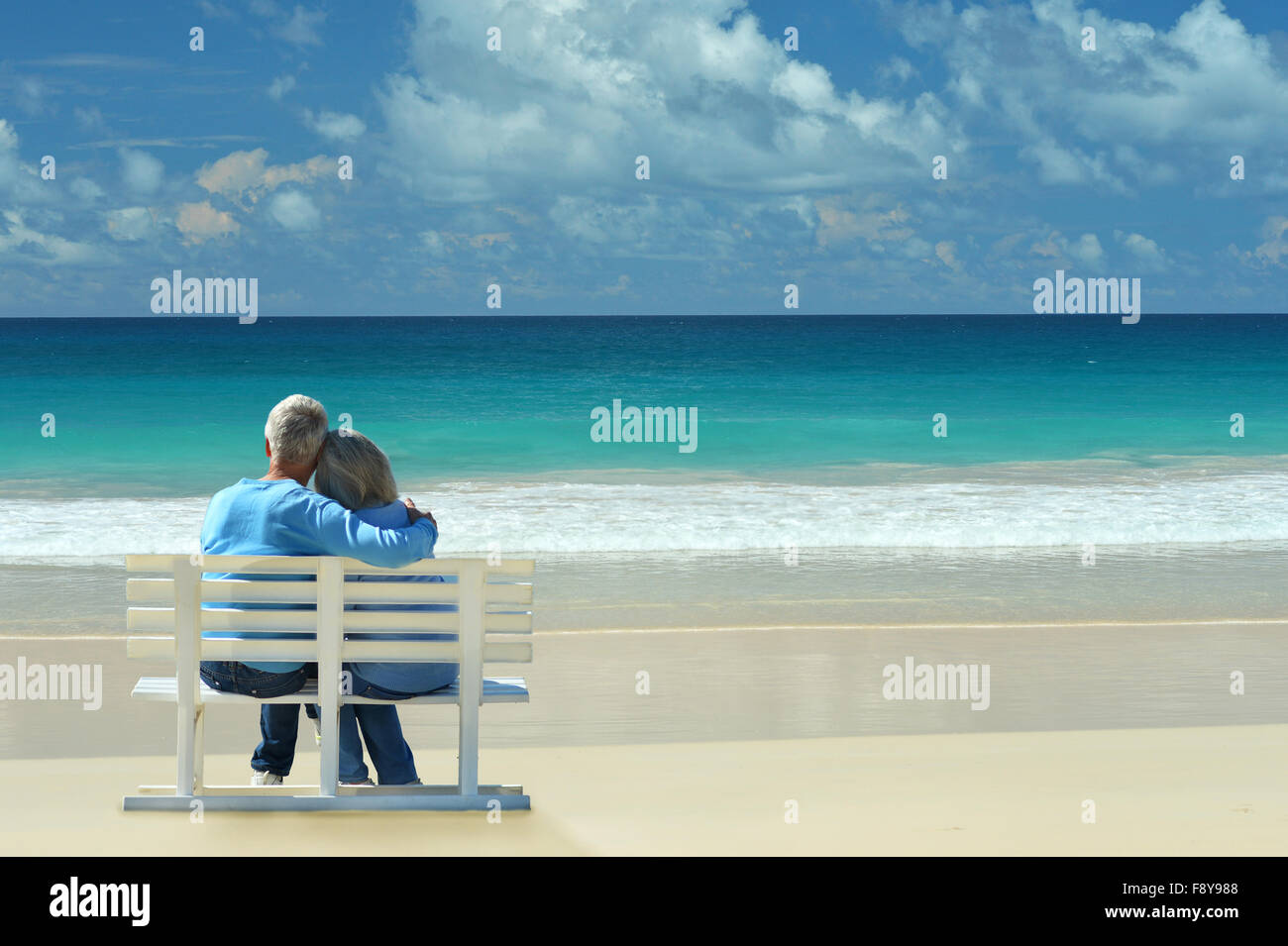 elderly couple rest at tropical resort Stock Photo - Alamy