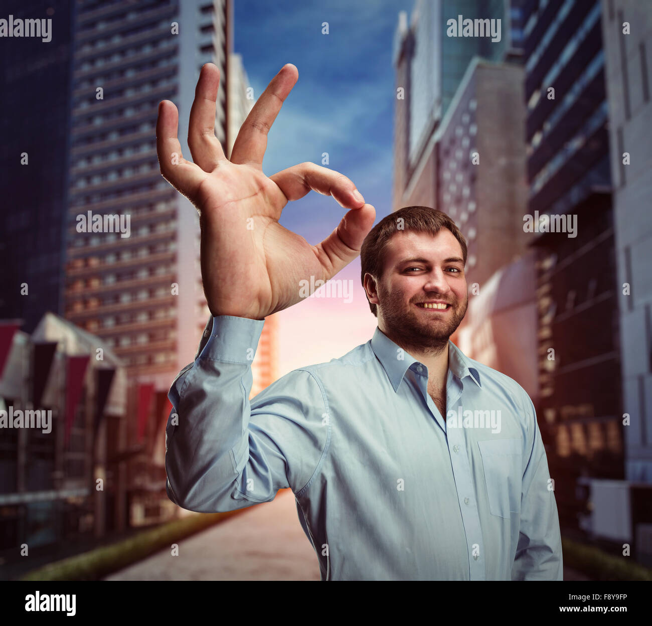 Man showing ok-sign Stock Photo - Alamy
