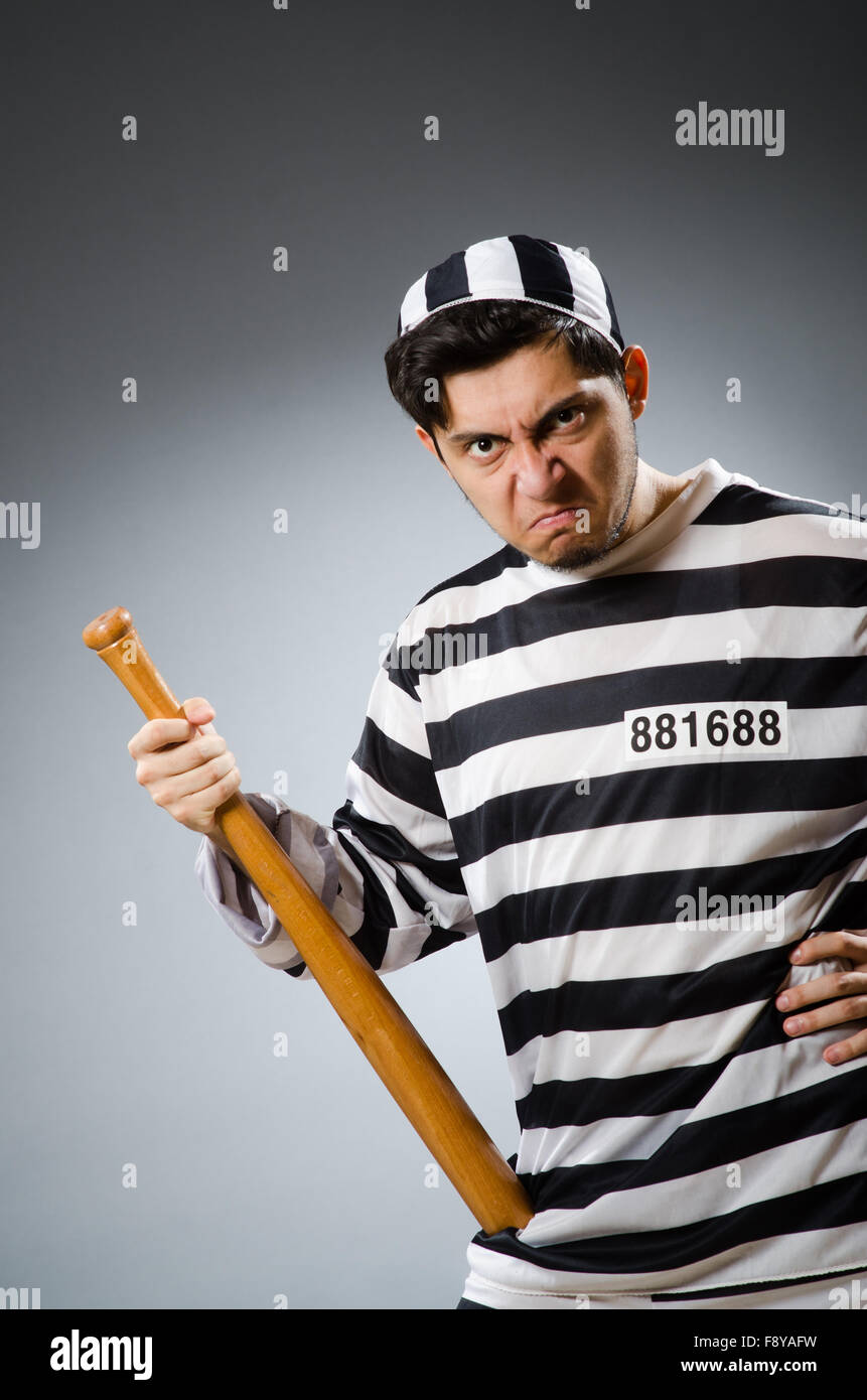 Funny prison inmate in concept Stock Photo - Alamy