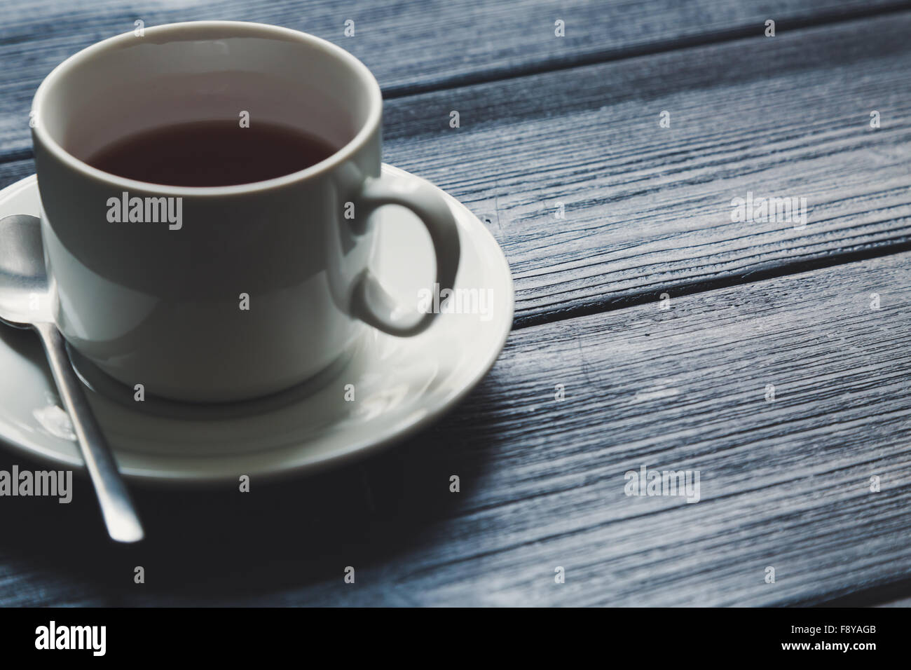 Cup of tea on Wooden Table Stock Photo - Alamy