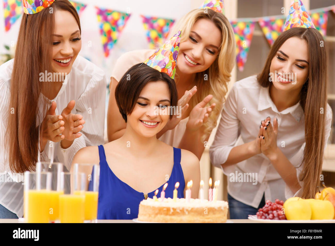Girls celebrating a birthday Stock Photo - Alamy