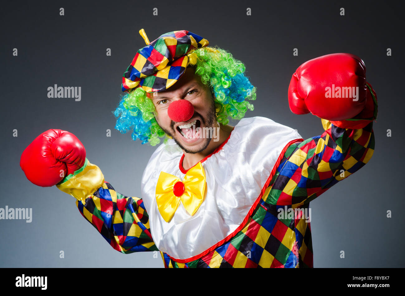 Funny clown with boxing gloves Stock Photo - Alamy