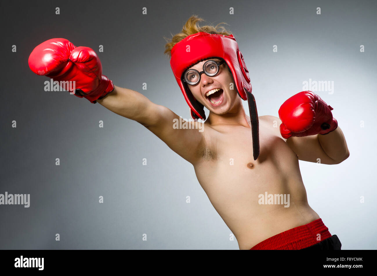 Funny boxer against dark background Stock Photo - Alamy