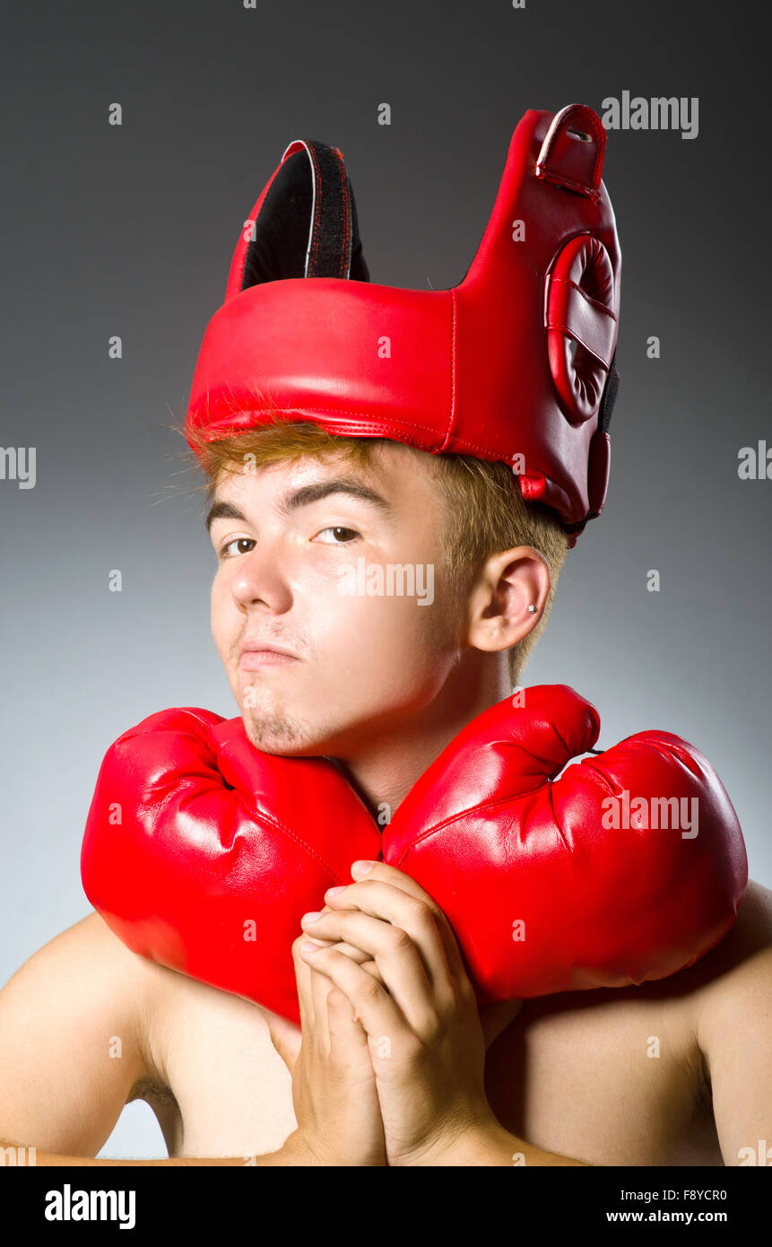 Funny boxer against dark background Stock Photo - Alamy