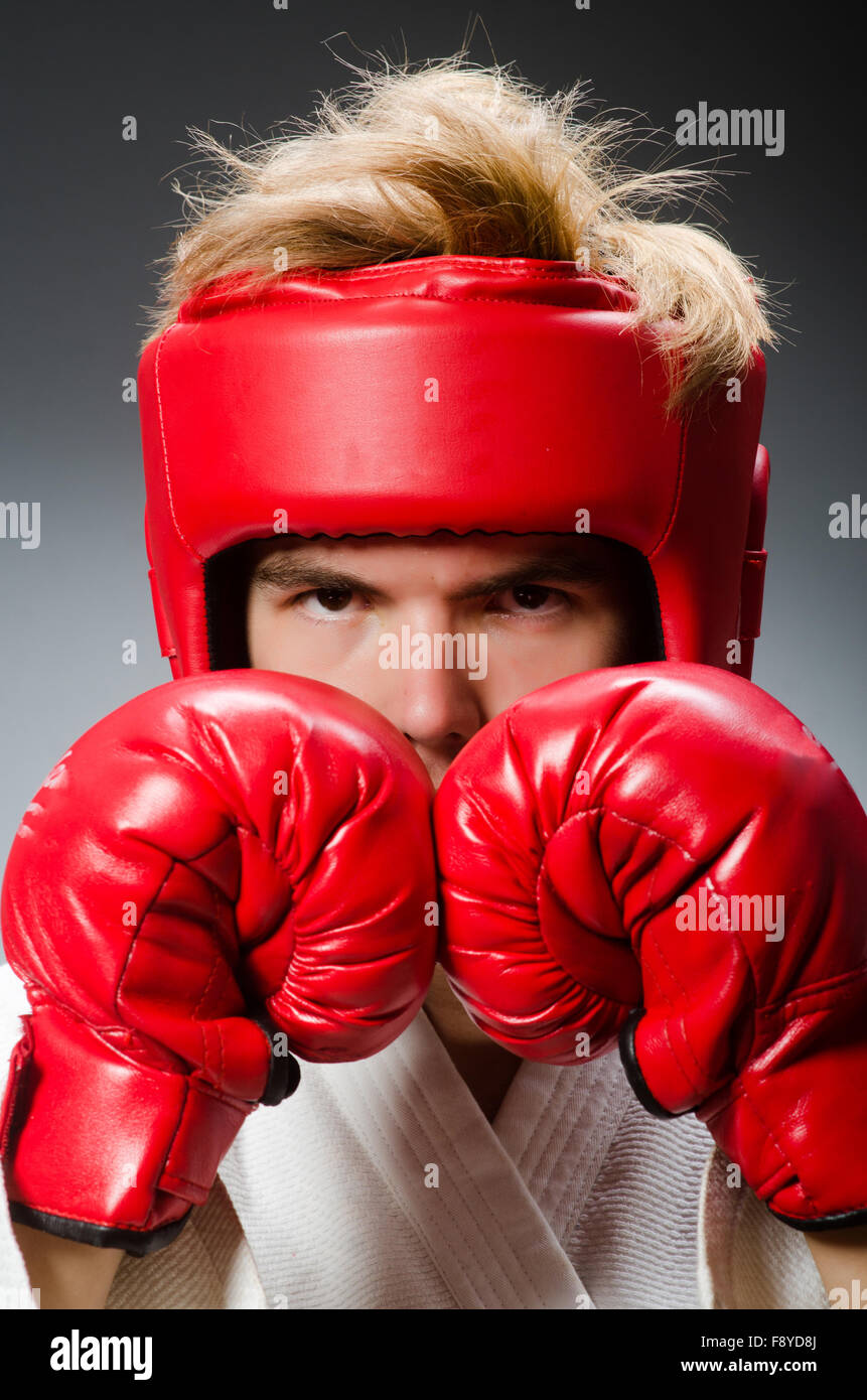 Funny boxer against dark background Stock Photo - Alamy