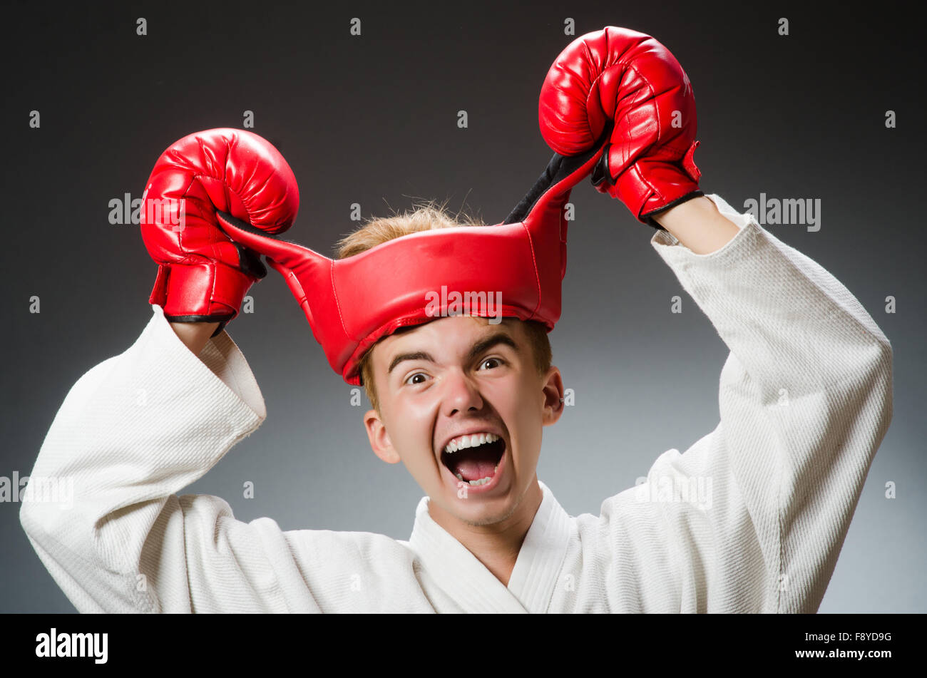 Funny boxer against dark background Stock Photo - Alamy