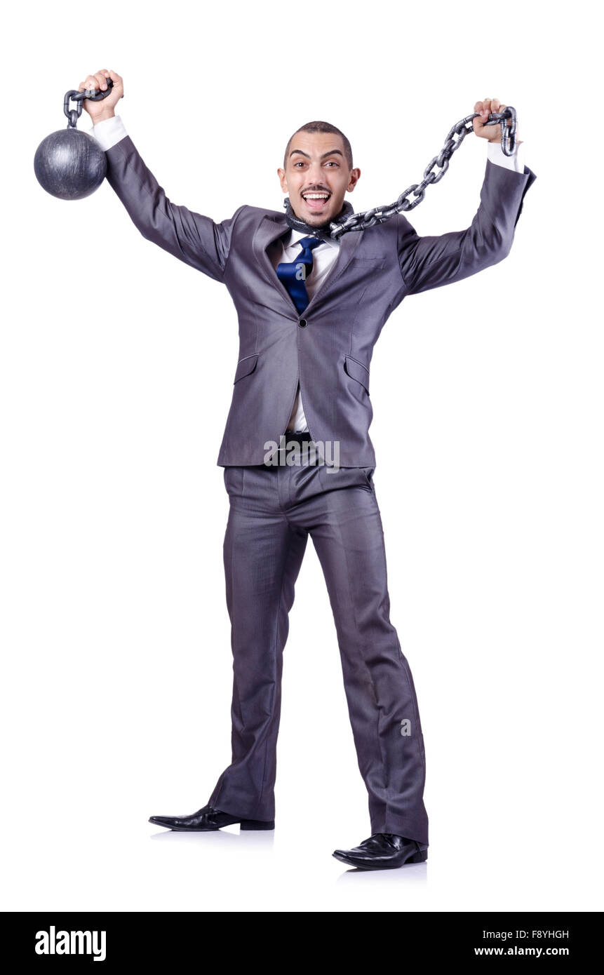 Businessman with shackles on white Stock Photo - Alamy