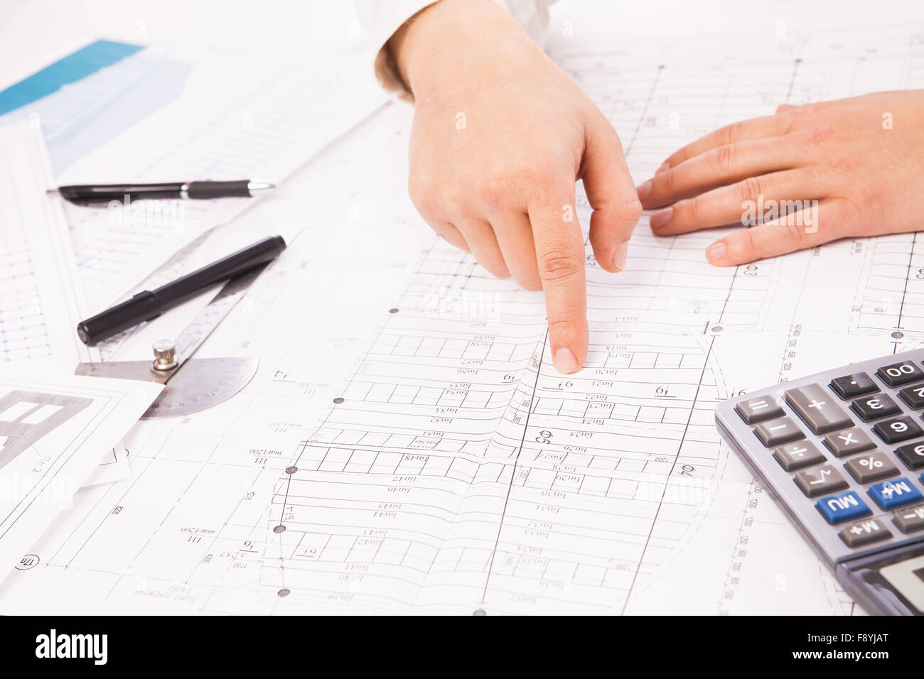 graph on background of businessman hands with pens Stock Photo - Alamy