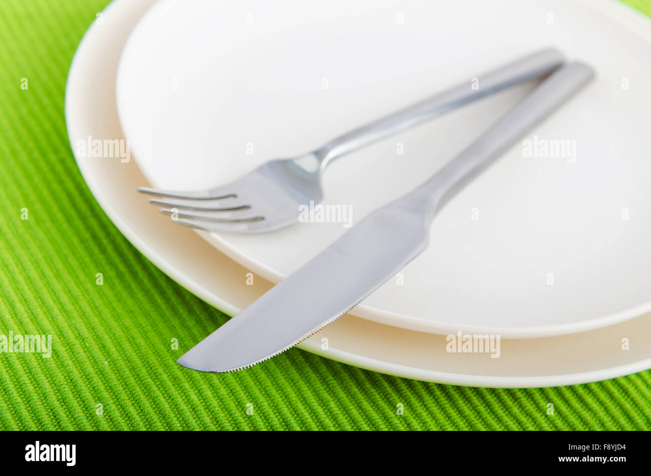 Table setting with knife and fork Stock Photo - Alamy